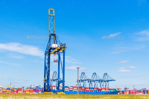 Cargo ship and truck at seaport waiting for container dock crane ...