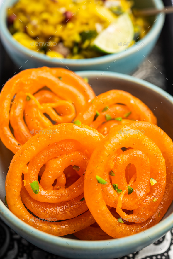 Aloo Poha with Jalebi, snack combination also called imarti and kande ...