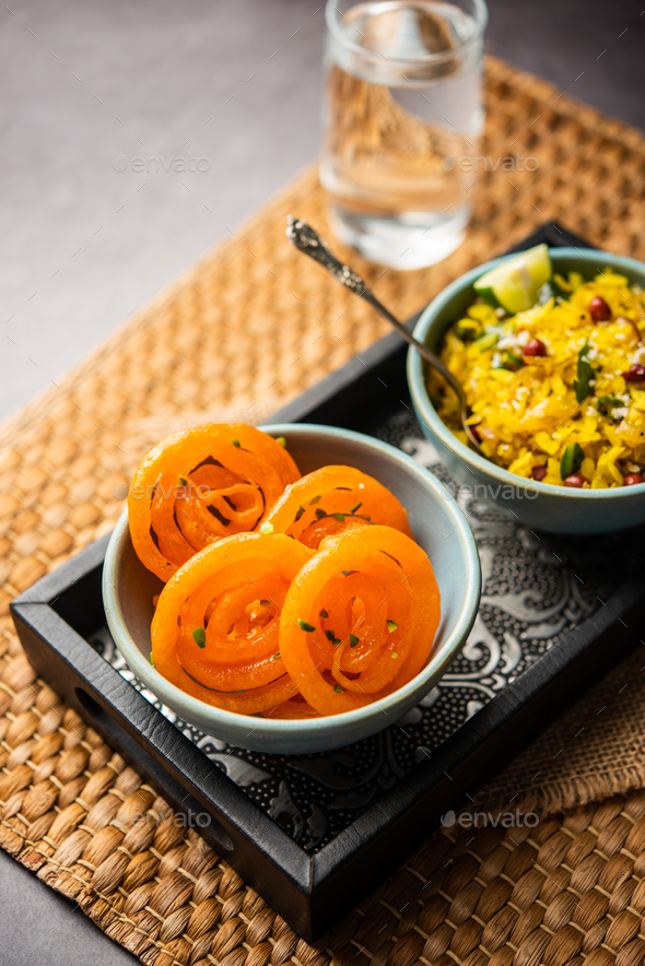 Aloo Poha with Jalebi, snack combination also called imarti and kande ...