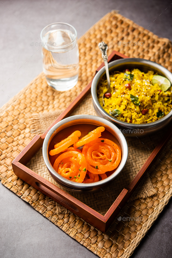Aloo Poha with Jalebi, snack combination also called imarti and kande ...