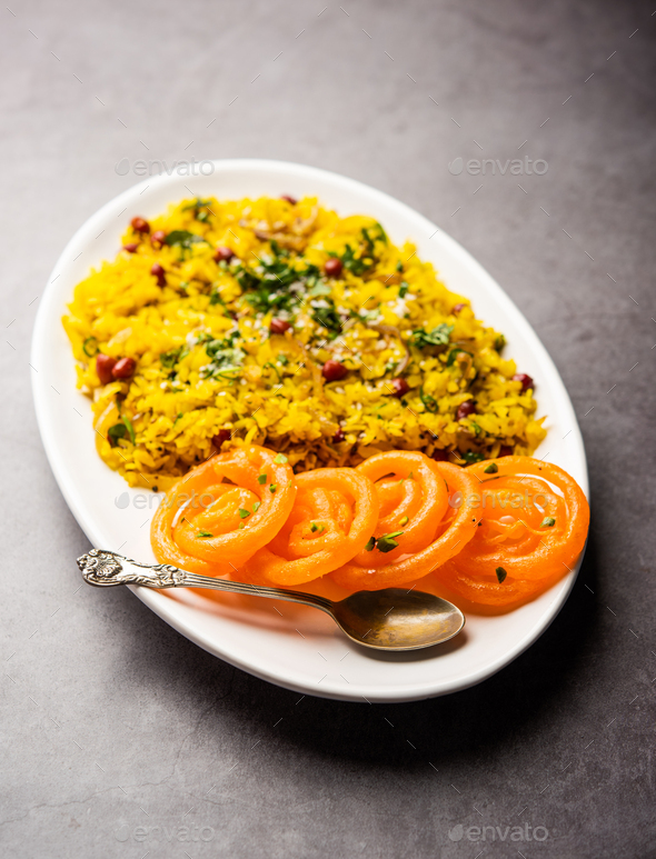 Aloo Poha with Jalebi, snack combination also called imarti and kande ...