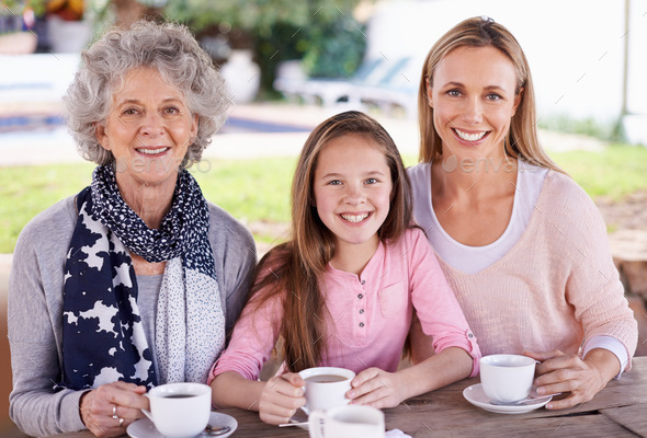 Shot of three generations of the woman of the women of a family having ...