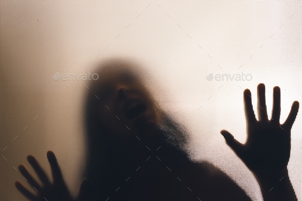 Shadowy figure behind glass - horror background Stock Photo by erika8213