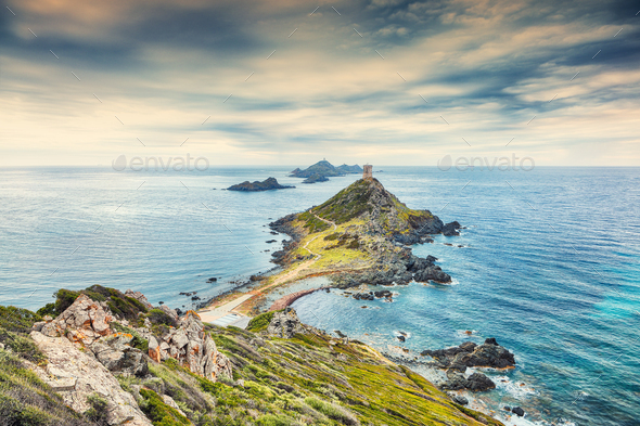 Sunset over popular tourist destination Torra di a Parata with Genoese ...