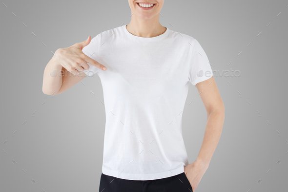 No face photo of woman pointing at her blank white t-shirt with finger ...