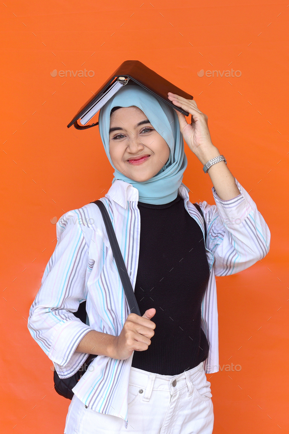 Muslim woman student Stock Photo by Garakta-Studio | PhotoDune