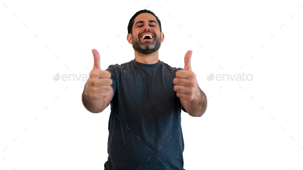 Happy male guy showing thumbs up and smiling broadly, giving positive ...