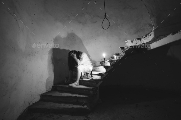Scary ghost woman in haunted house with rope with a noose Stock Photo ...