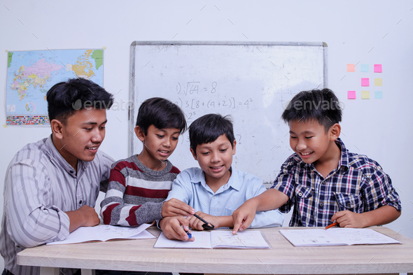 Group discussion at classroom Stock Photo by Queenmoonlit3 | PhotoDune