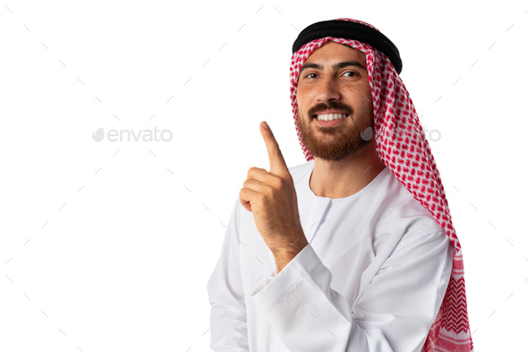 Young Arab man pointing hand isolated on white background Stock Photo ...