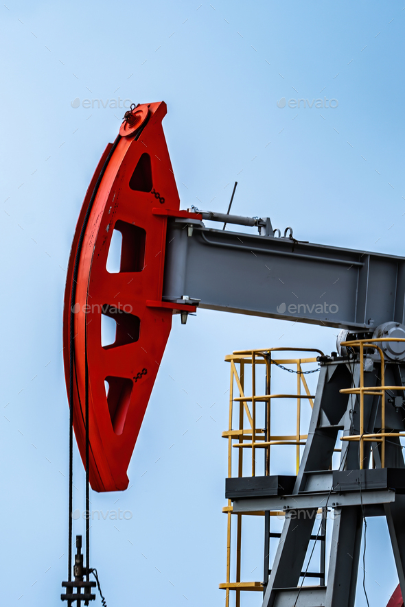 Crude oil extraction. Close-up detail of oil rig. Stock Photo by Statuska