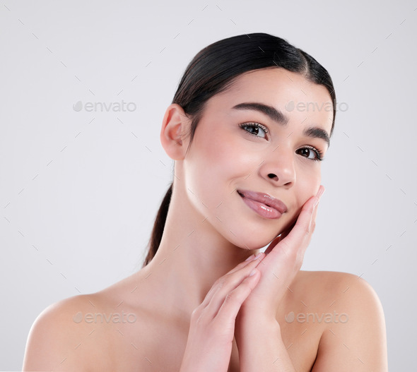 The softest skin. Studio portrait of an attractive young woman posing ...