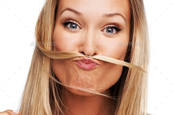 Funny and charming. A beautiful young woman being playful while ...