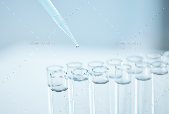 Be careful with those samples. Closeup shot of a dropper being used to ...