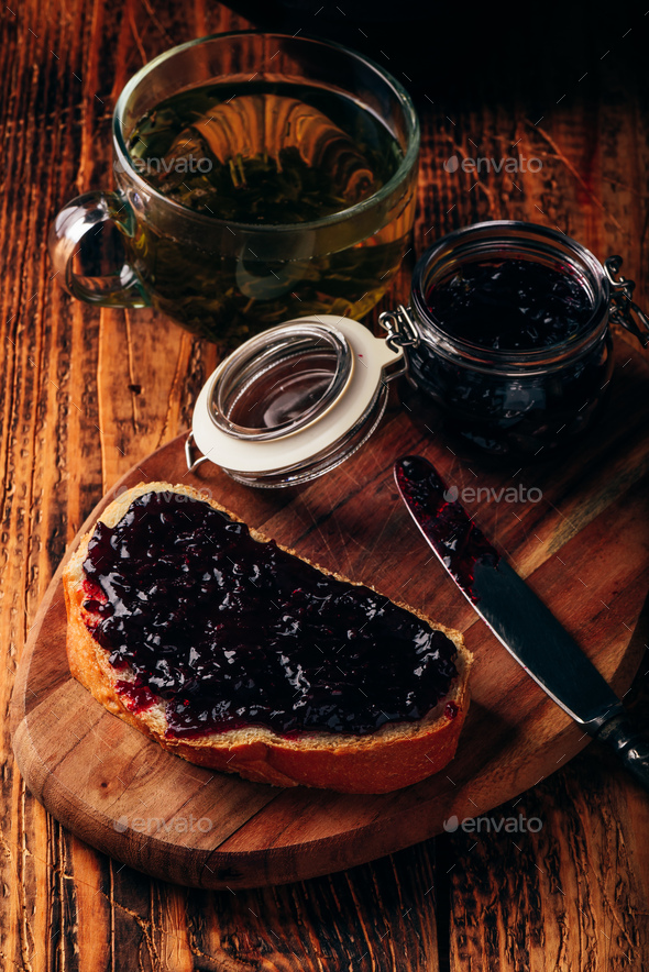 Toast with berry jam and green tea Stock Photo by Seva_blsv | PhotoDune