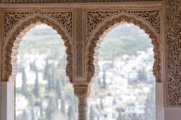finely chiseled windows the city of the Alhambra Stock Photo by mazzafabio
