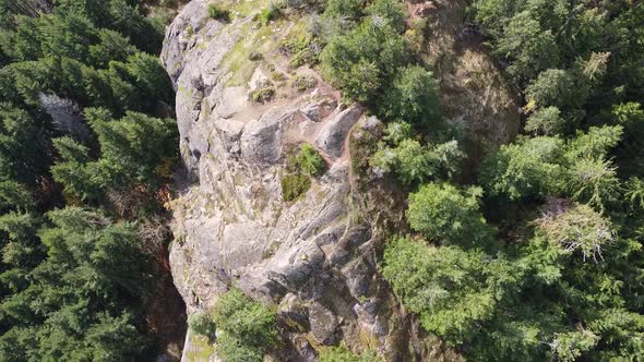 Mount Prevost, Vancouver Island. Rocky cliffs and tree-covered forest ...