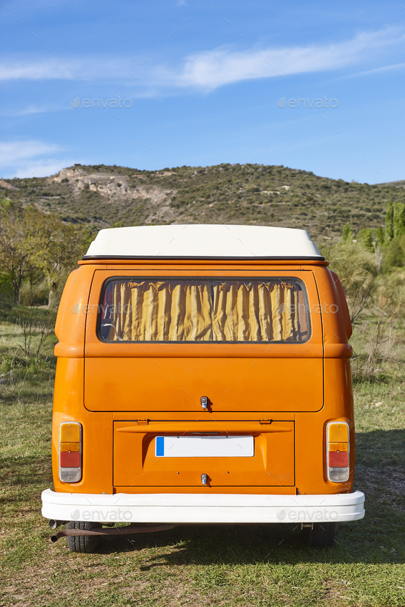 Vintage camper van in the countryside. Recreational vehicle. Summertime ...