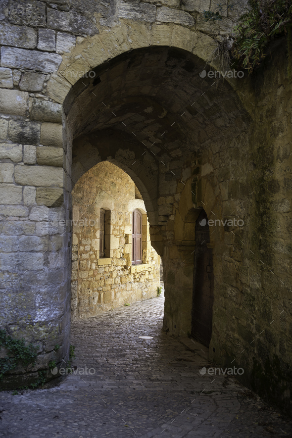 old limestone houses with brick art above the street Stock Photo by ...