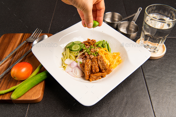 Delicious Thai food prepared by authentic Thai chefs Stock Photo by wosunan