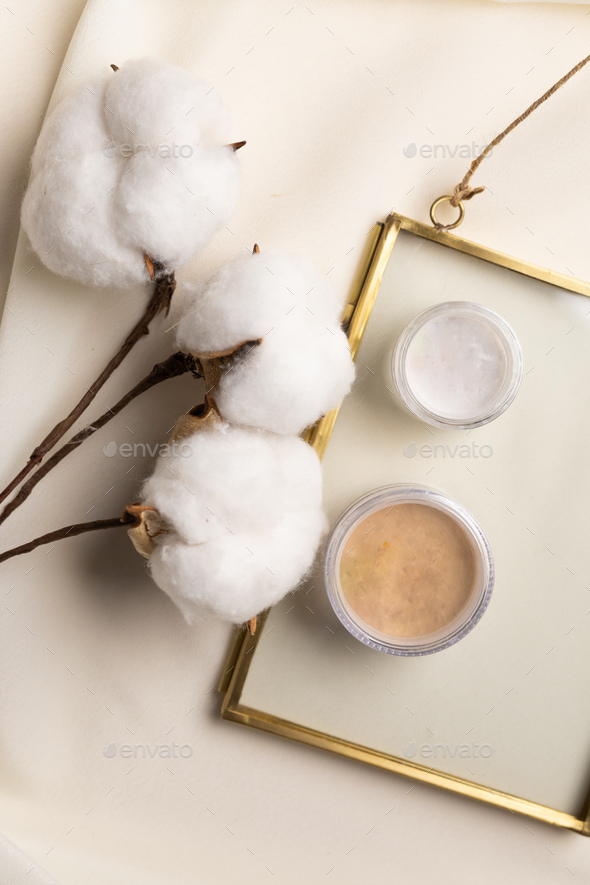 Top view facial powder on natural background with dried flowers ...