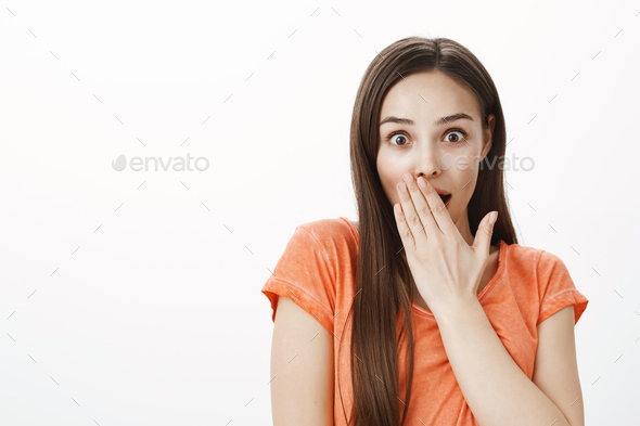 Chatty girl likes gathering rumors in office. Portrait of surprised and ...