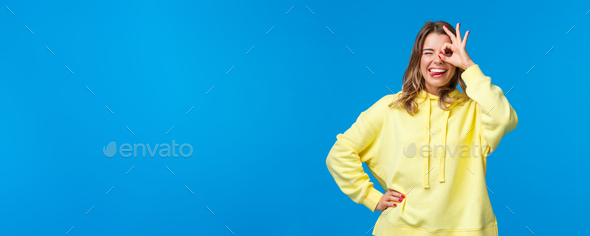 No problem, stay relaxed. Carefree and chill good-looking blond girl ...