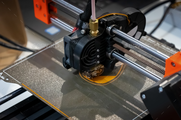 3D printer in operation Stock Photo by Graphico_ | PhotoDune