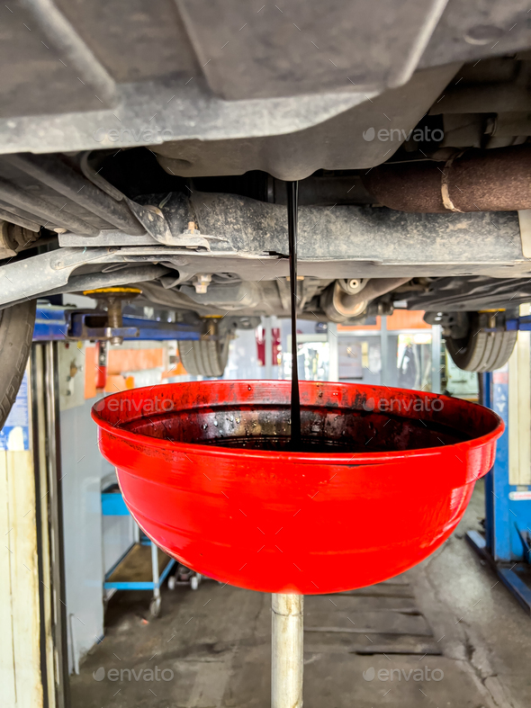 Waste engine oil replacement process Stock Photo by Ramo9 | PhotoDune