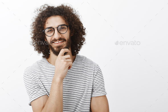 Nice idea, you intrigued me. Portrait of interested smart handsome ...