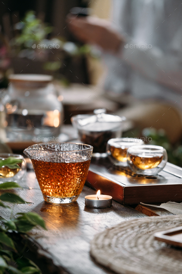 Beautiful chinese tea in teacup with candle flame decoration Stock ...