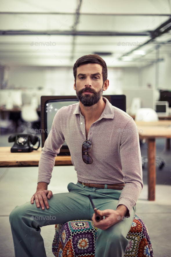 Bringing a retro-feel to the office. A businessman in retro attire ...