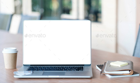 Laptop with blank screen on table. Workspace background new project on ...
