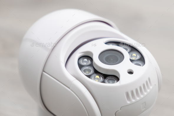 Modern CCTV camera is ready for installation on the table Stock Photo ...