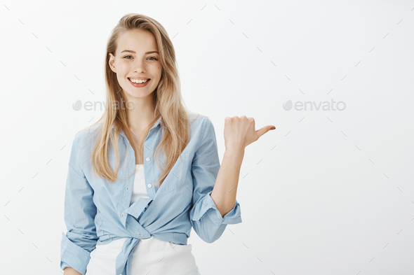 Portrait of positive good-looking european girl with blond hair in ...