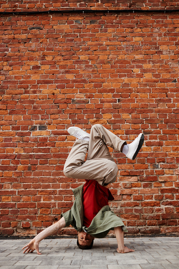 Breakdancing Pose Vertical Stock Photo by seventyfourimages | PhotoDune