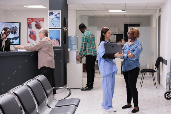 Cardiovascular care institute busy reception area Stock Photo by DC_Studio