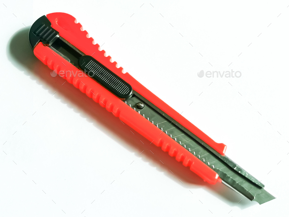 Side view of red utility knife isolated on white background. Stock ...