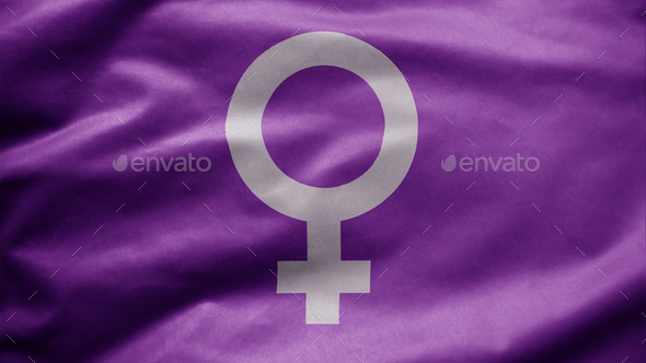 Woman gender sign with purple flag blowing soft silk. Feminism symbol ...