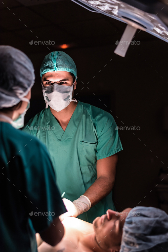 Doctors during operation in hospital operating room with patient Stock ...