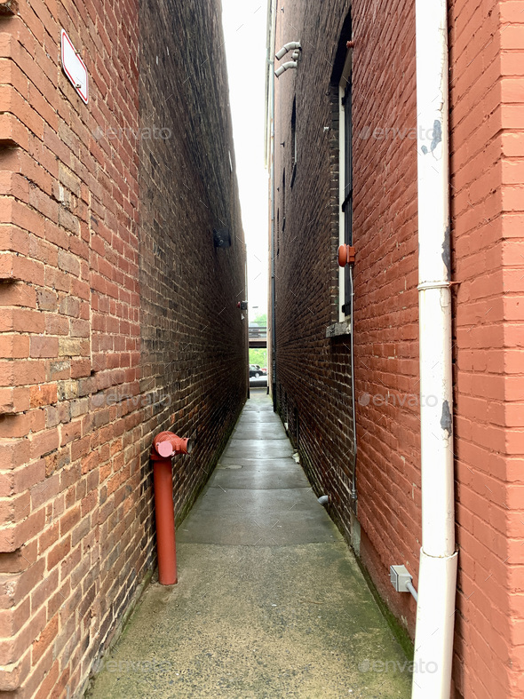 Deep Alley View Between Brick Building's Walls in the City. Stock Photo ...