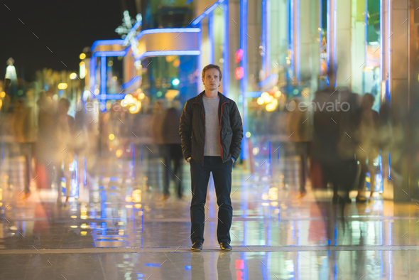 The man stand in the smash ghost crowd stream. Evening night time Stock ...