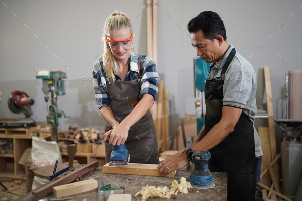 Carpenters Assembling Furniture, Small business in wood DIY workplace ...