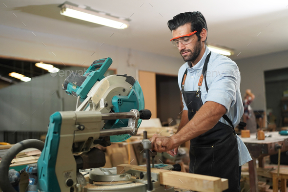 Carpenters Assembling Furniture, Small business in wood DIY workplace ...