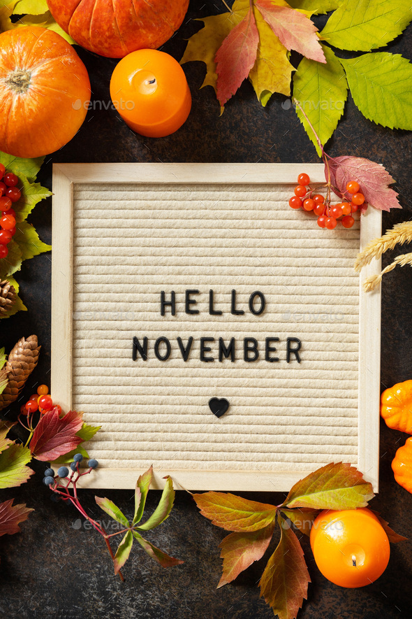Autumn background with Hello November letters and autumn message board ...
