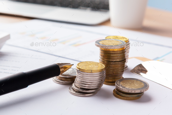 Saving stack coins money concept. Graph, chart document close up Stock ...