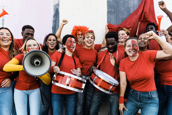 Football fans having fun supporting favorite team - Soccer sport ...