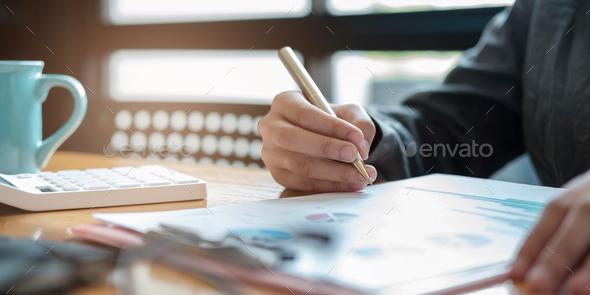 Accountant using a calculator to calculate the numbers. Accounting ...