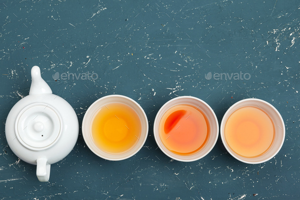Collection of different teas in cups with tea leaves Stock Photo by ...