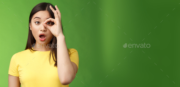 Amazed speechless cute asian young girl drop jaw astonished, look ...